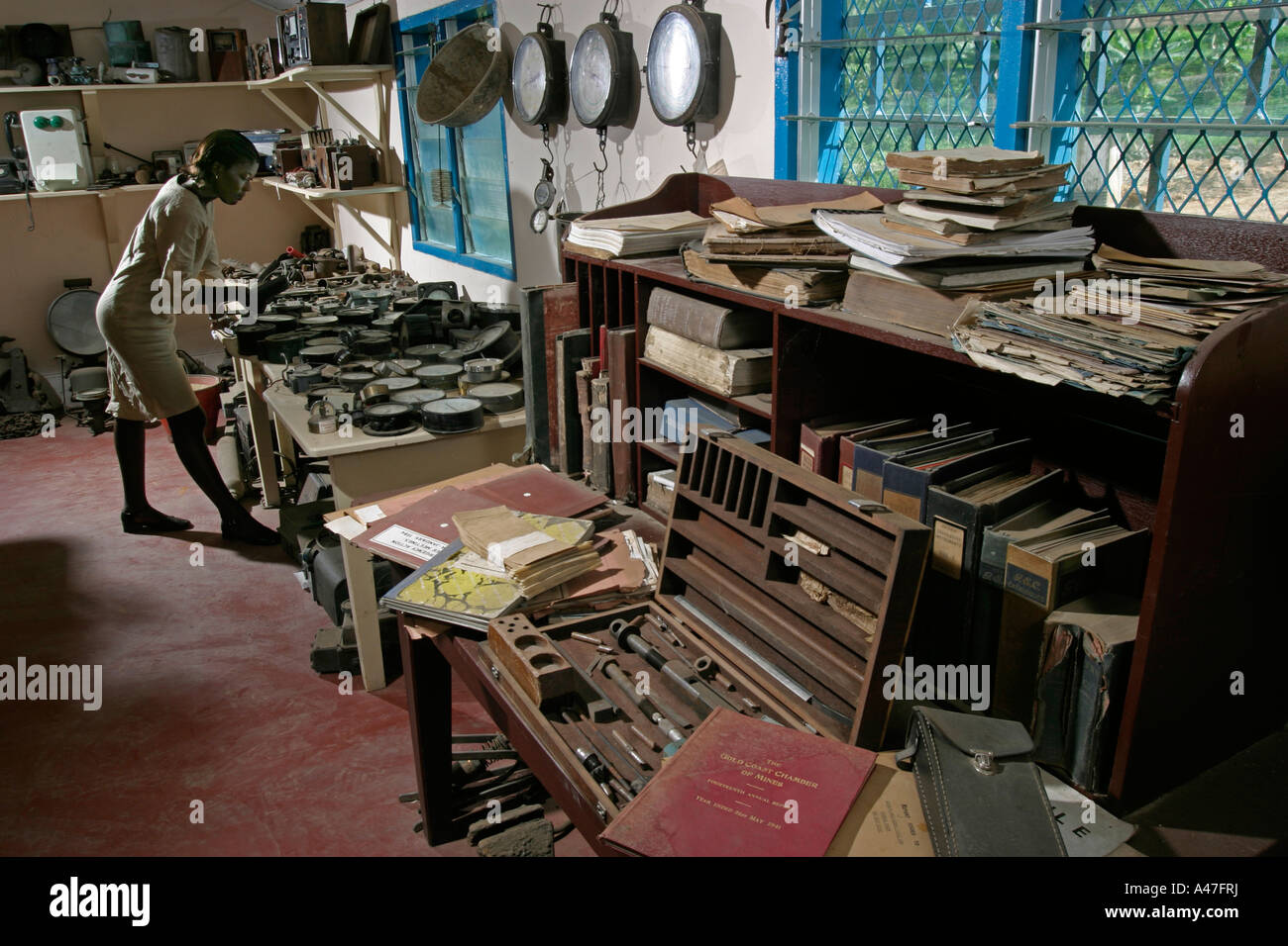 Woman curator in goldmine information centre and museum, Prestea, Ghana ...