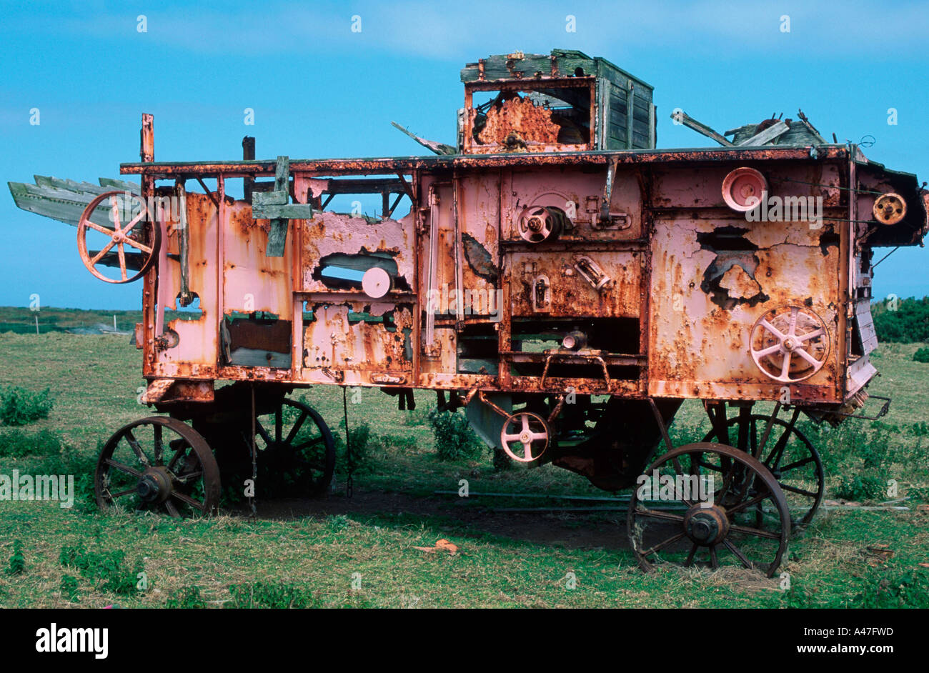 Rusted threshing machine Stock Photo - Alamy