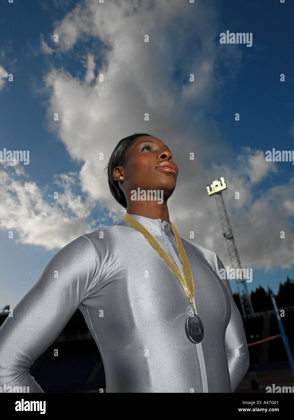 Female runner wearing medal hi-res stock photography and images - Alamy