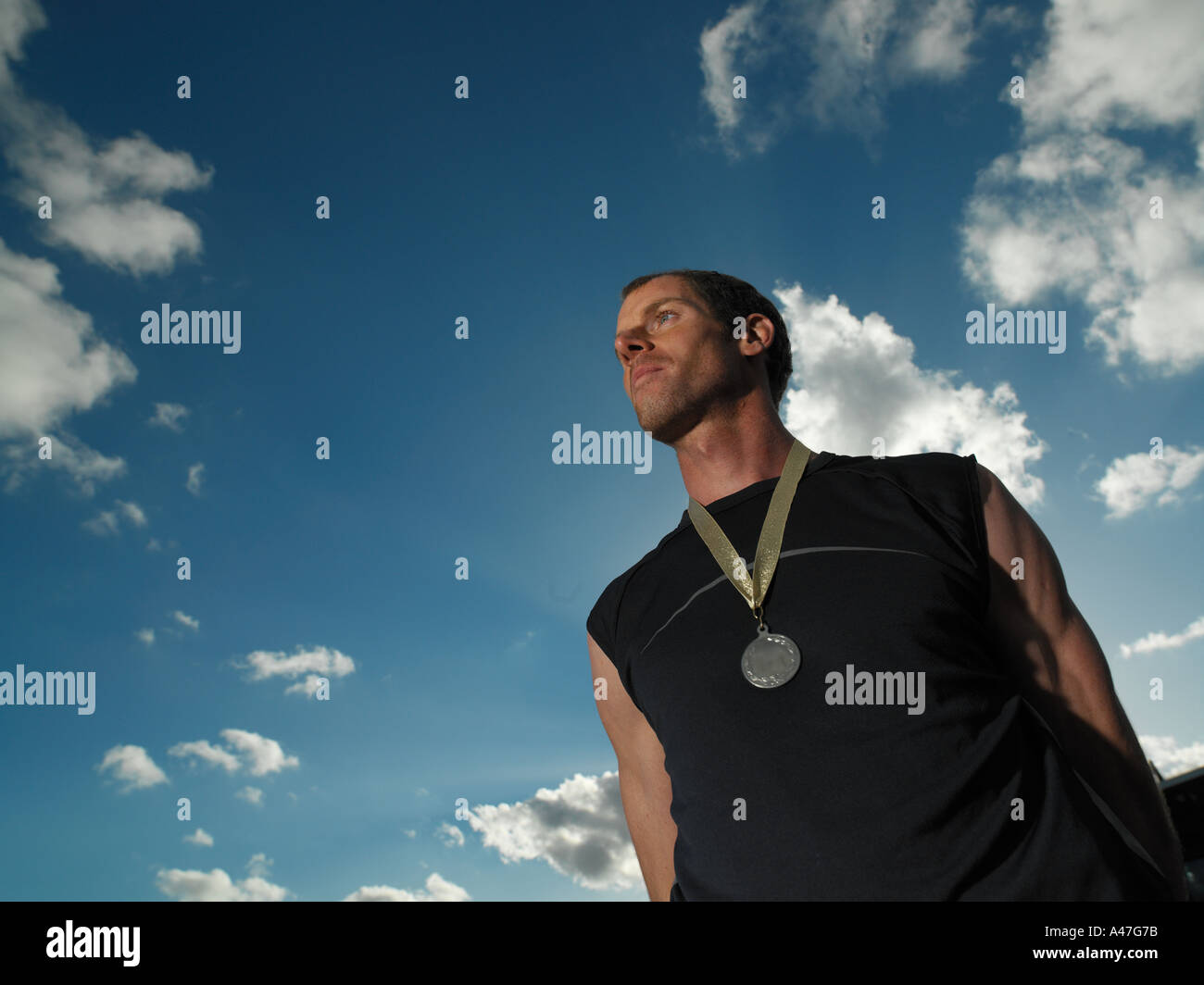 Male athlete wearing medal hi-res stock photography and images - Alamy