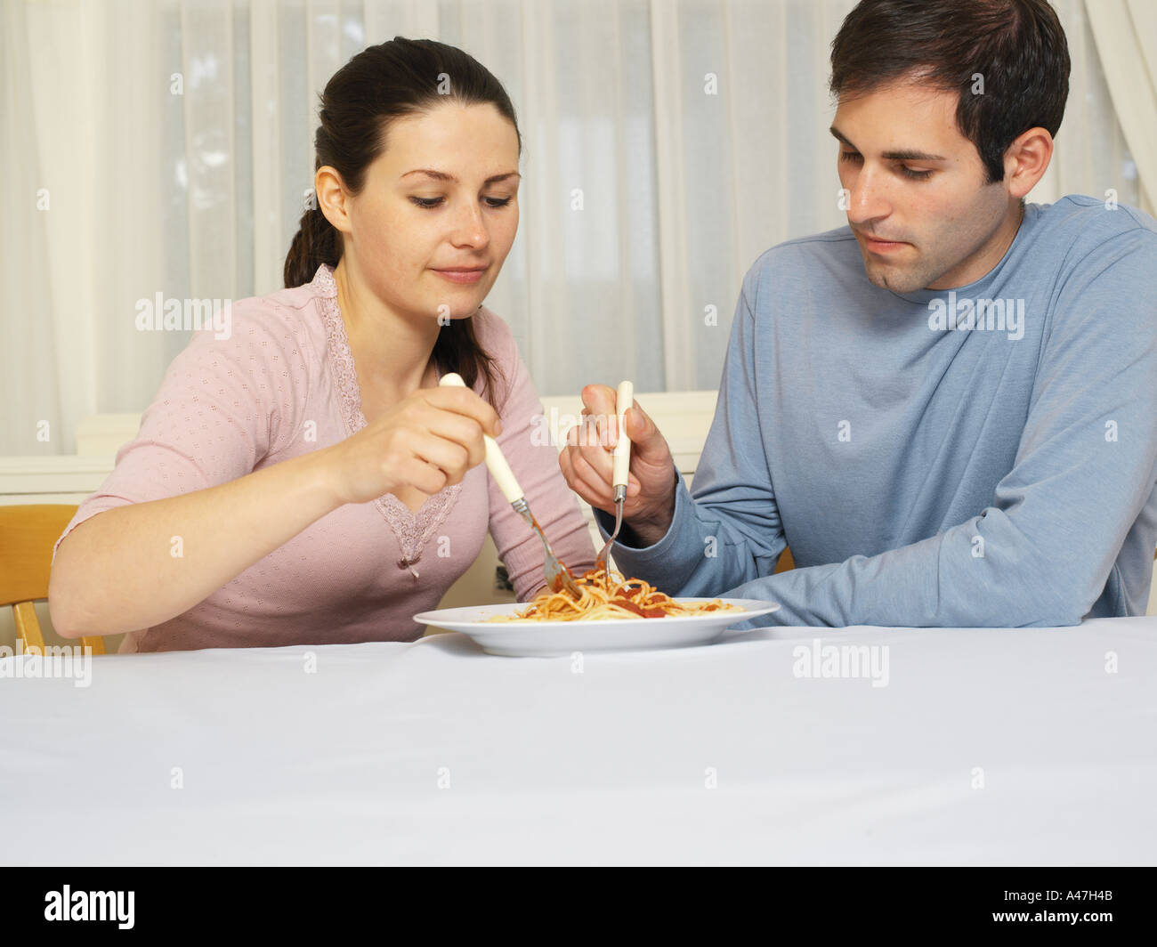 Woman holding spaghetti bolognese hi-res stock photography and images ...