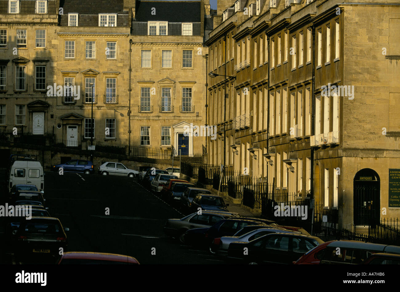 historic city of bath cars parked on quiet street with old houses in ...