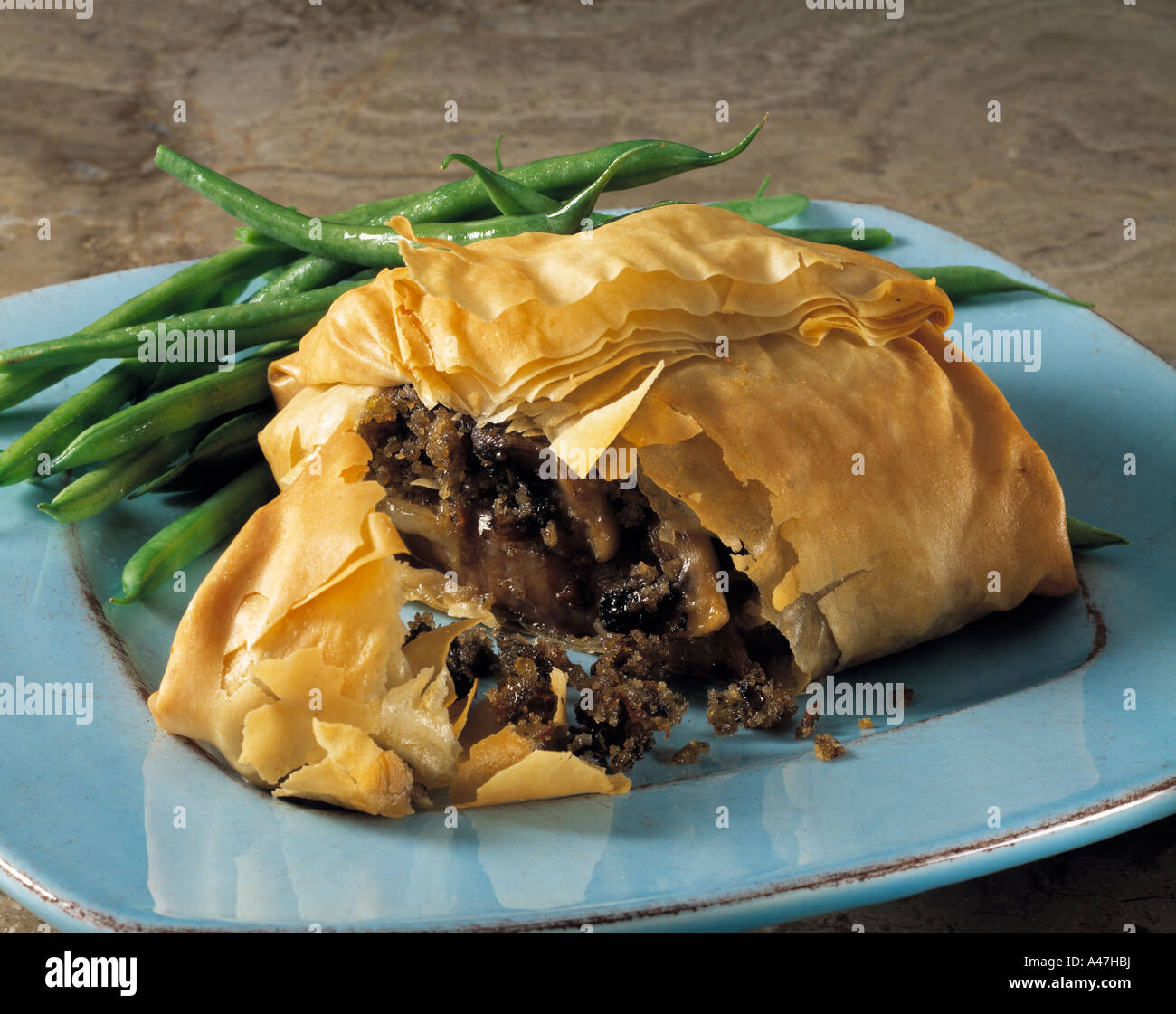 A filo parcel with French beans editorial food Stock Photo - Alamy