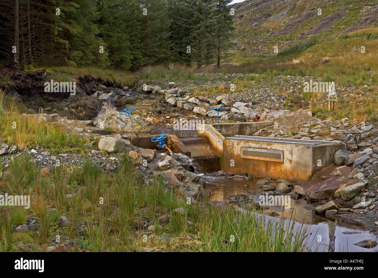 Weir of small scale hydro electric power scheme, Scotland UK Stock ...