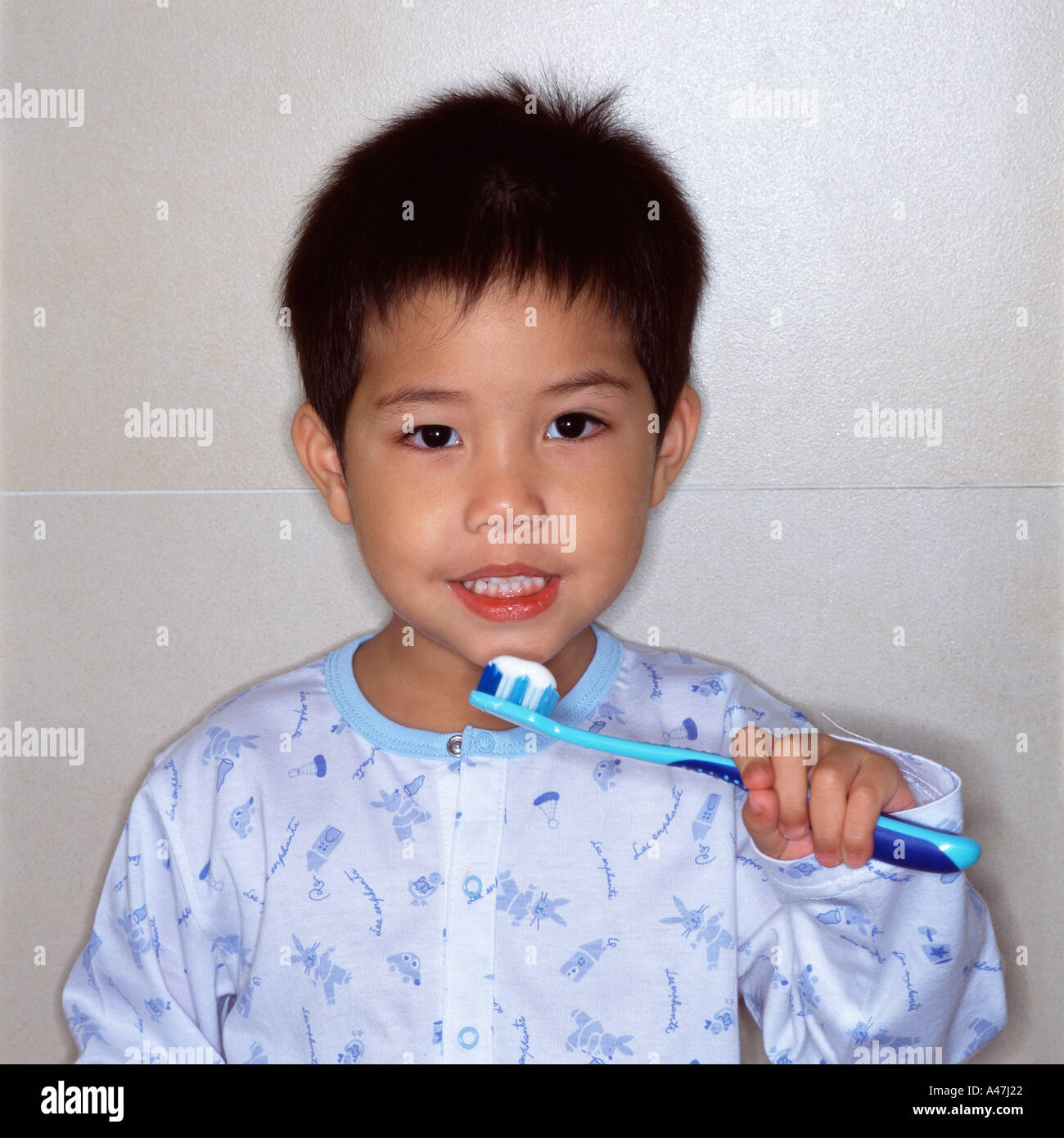 Boy brushing his teeth Stock Photo - Alamy