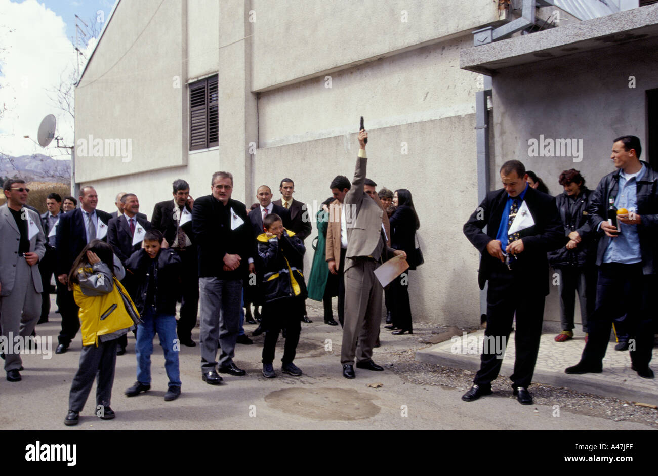 Shooting man firing gun celebrate hi-res stock photography and images ...