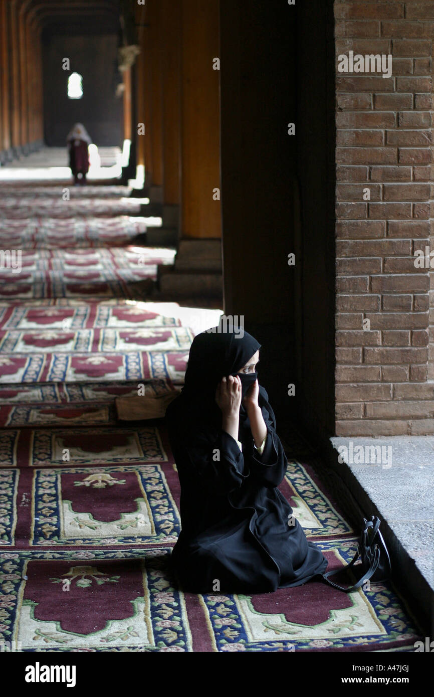 A Musilm girl sits in a mosque in Srinagar in Kashmir in India Stock ...