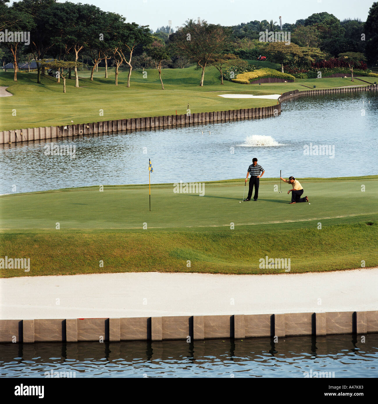 Two men playing golf hi-res stock photography and images - Alamy