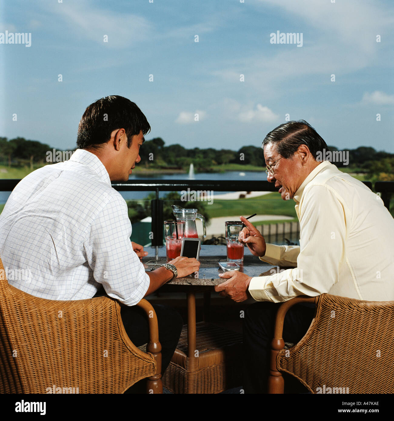 Father and son talking Stock Photo - Alamy