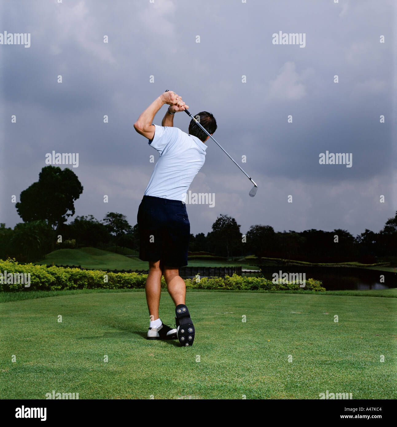 Mature male golfer hitting hi-res stock photography and images - Alamy
