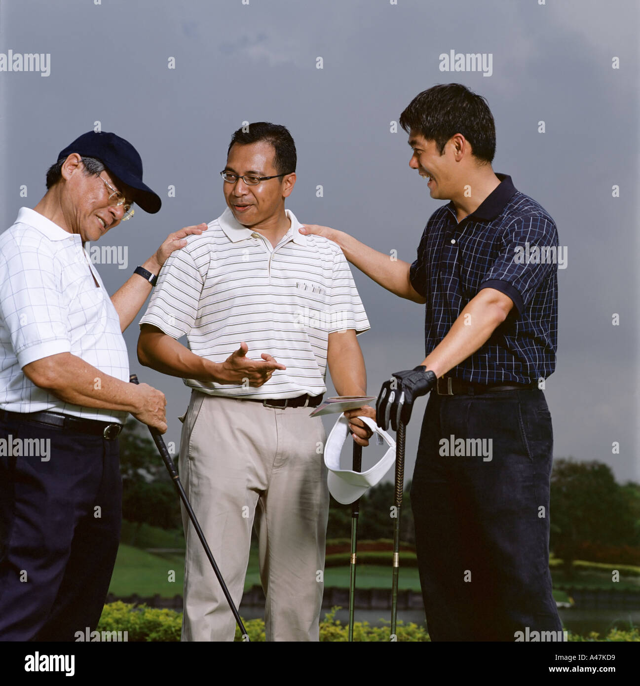 Golfers laughing hi-res stock photography and images - Alamy