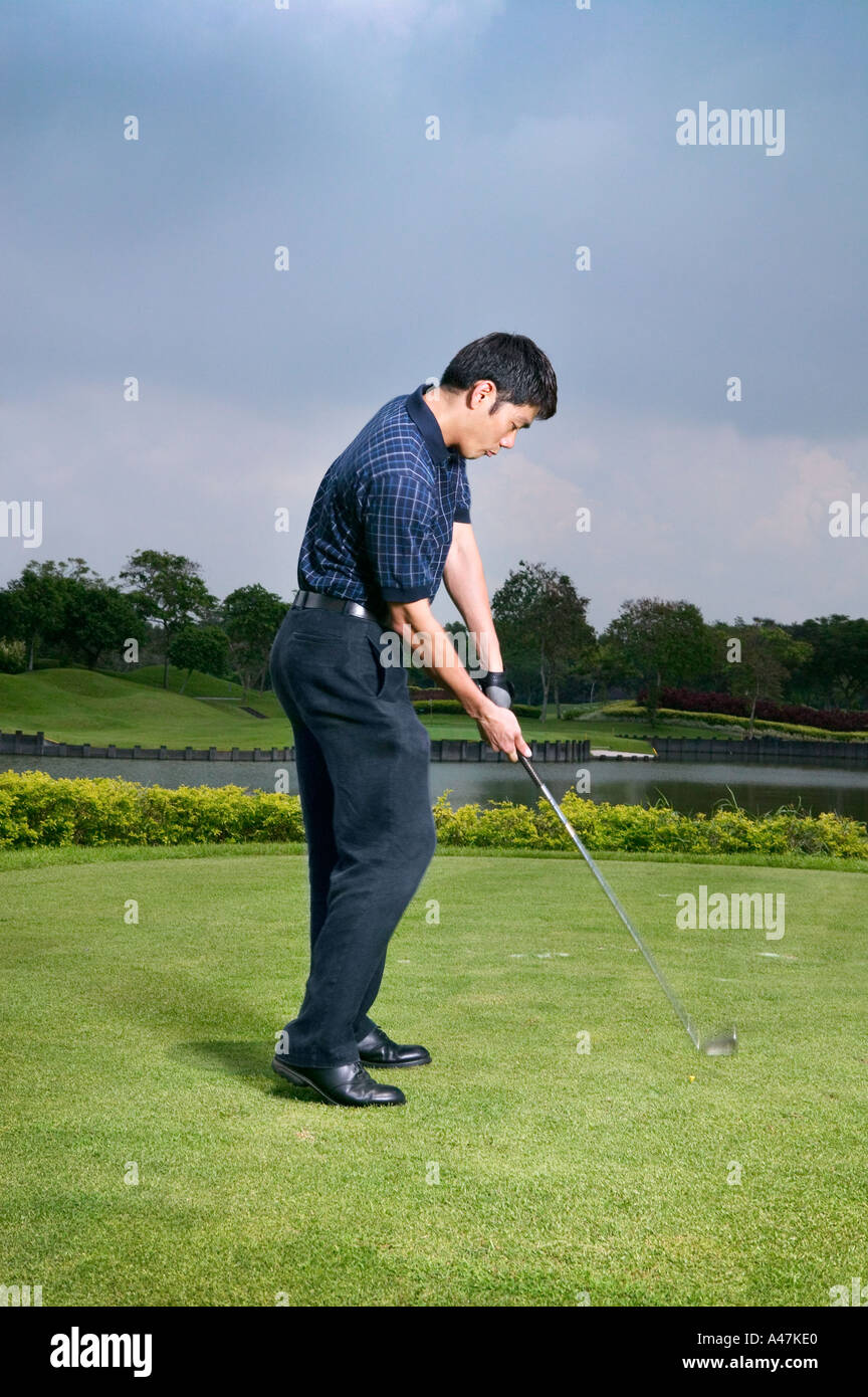 Hitting golf ball asian hi-res stock photography and images - Alamy