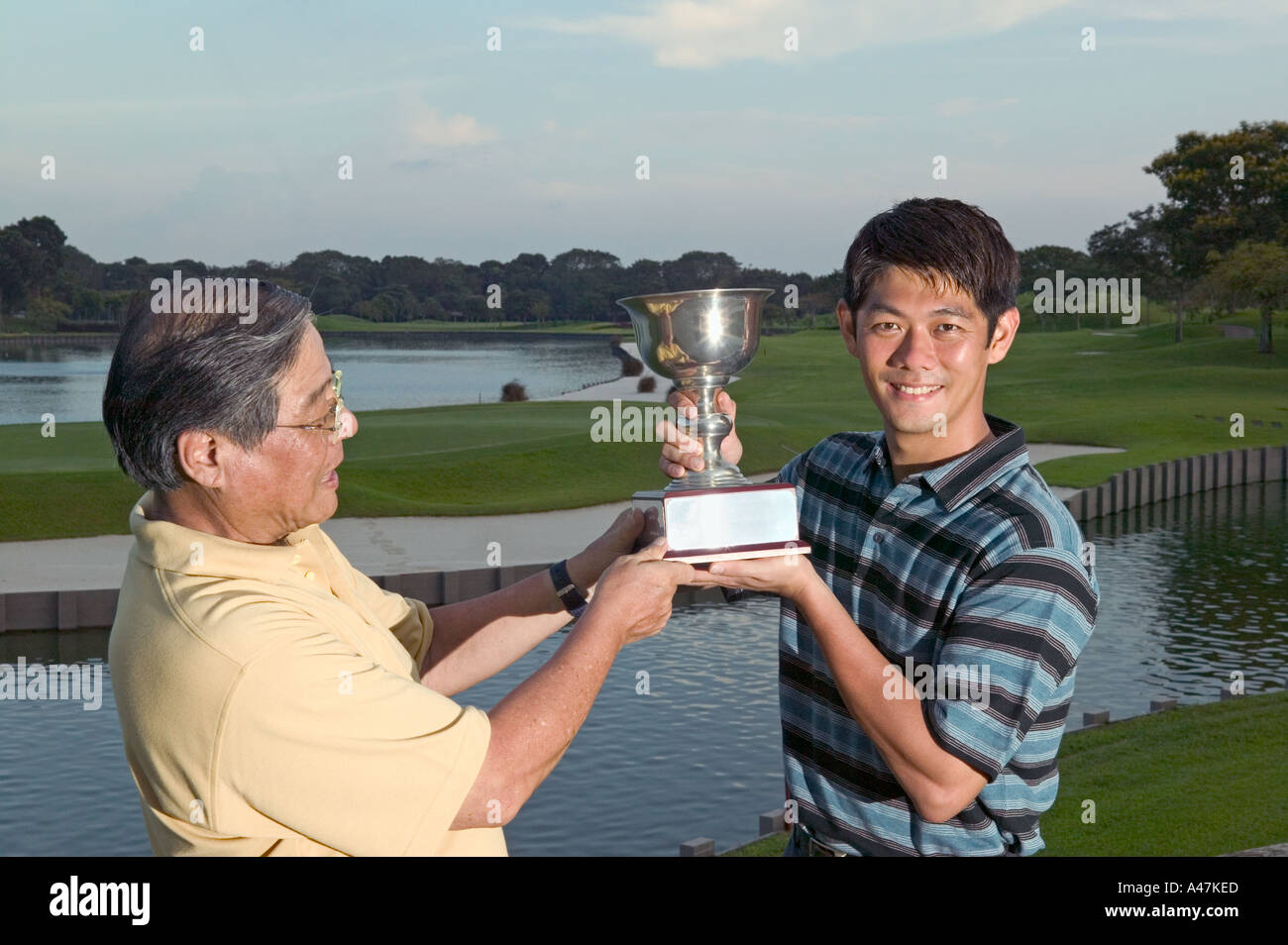 Half length smiling trophy hi-res stock photography and images - Alamy