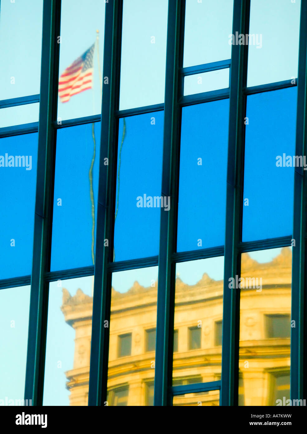 Building and flag reflected in windows downtown Milwaukee Wisconsin USA ...