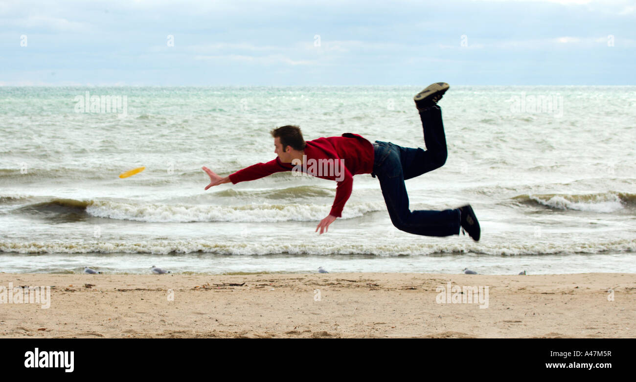 Male catching frisbee hi-res stock photography and images - Alamy