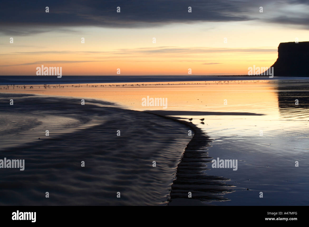 Beach view at Saltburn in North Yorkshire with pre sunrise colours in ...