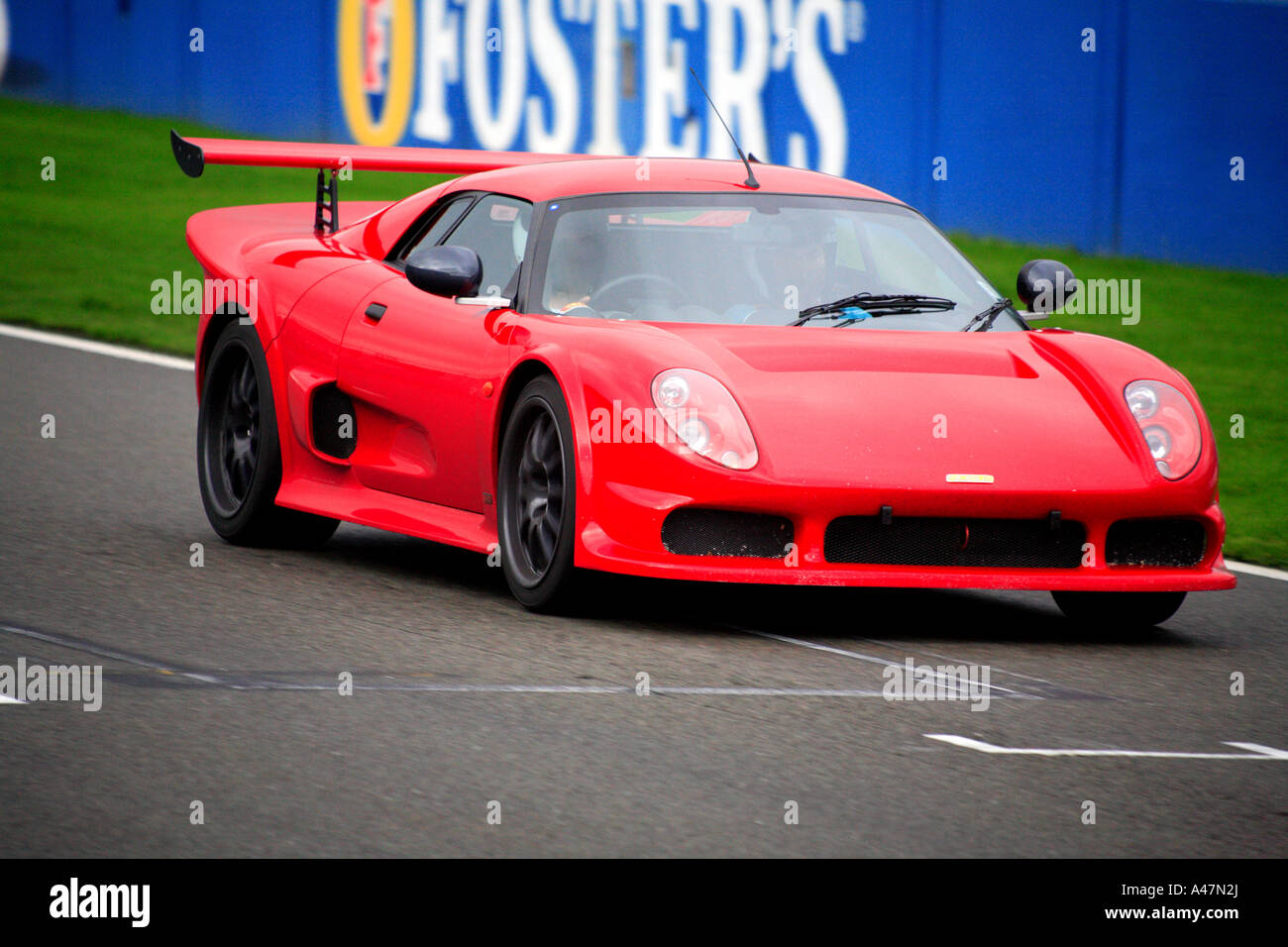 Noble track race car red speed motor sport racing Stock Photo - Alamy