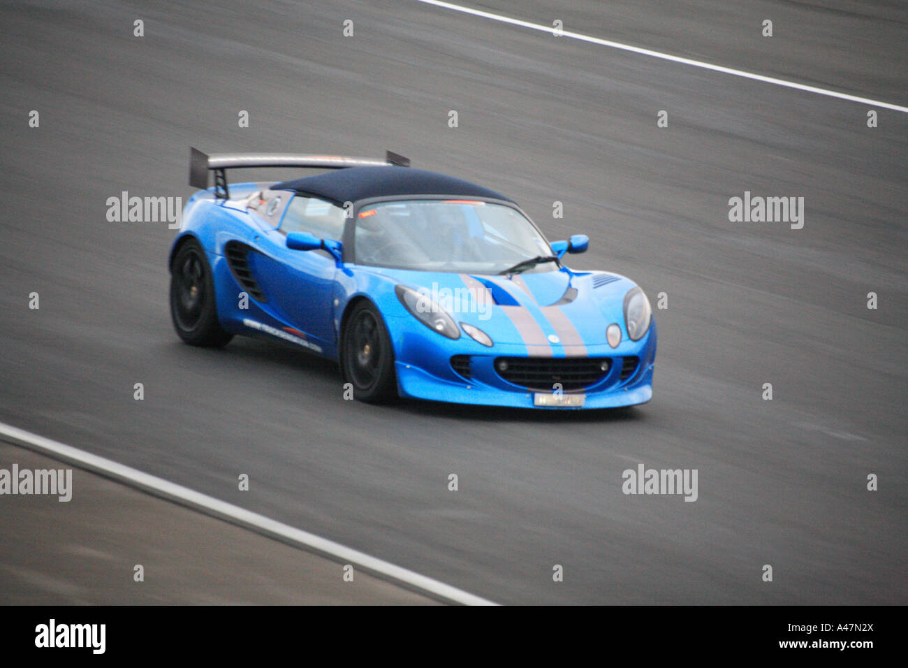 Lotus Elise track race car blue fast speed motor sport racing Stock ...