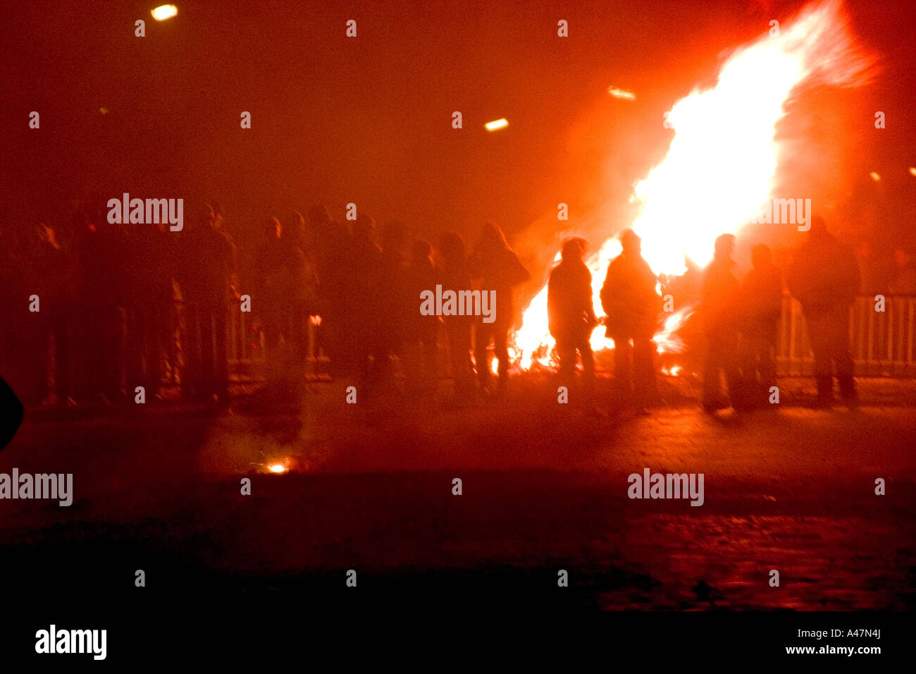 Fire flame gathering danger Stock Photo - Alamy