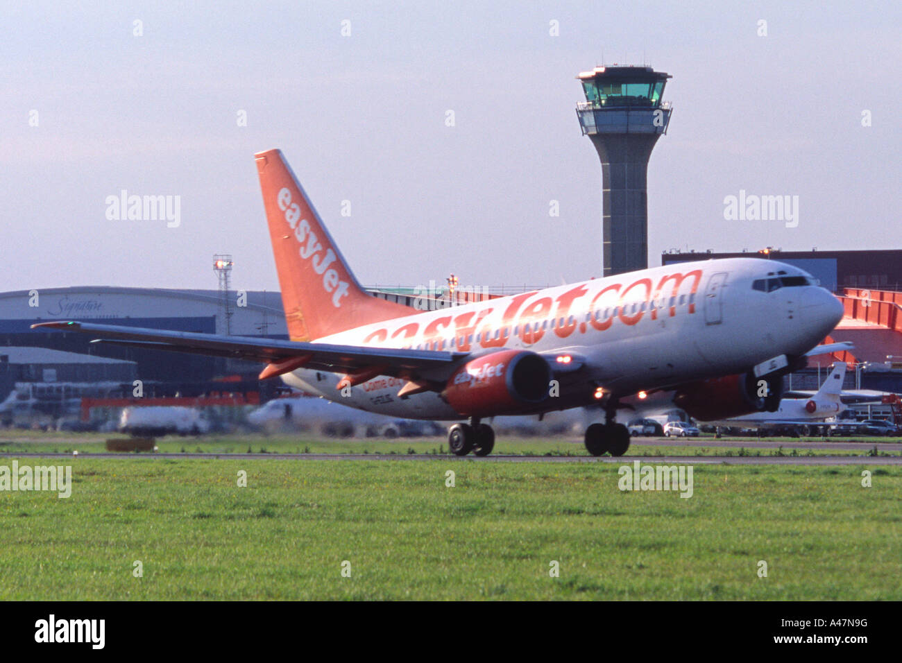 Easyjet Boeing 737 plane take off from runway at Luton Airport with ...