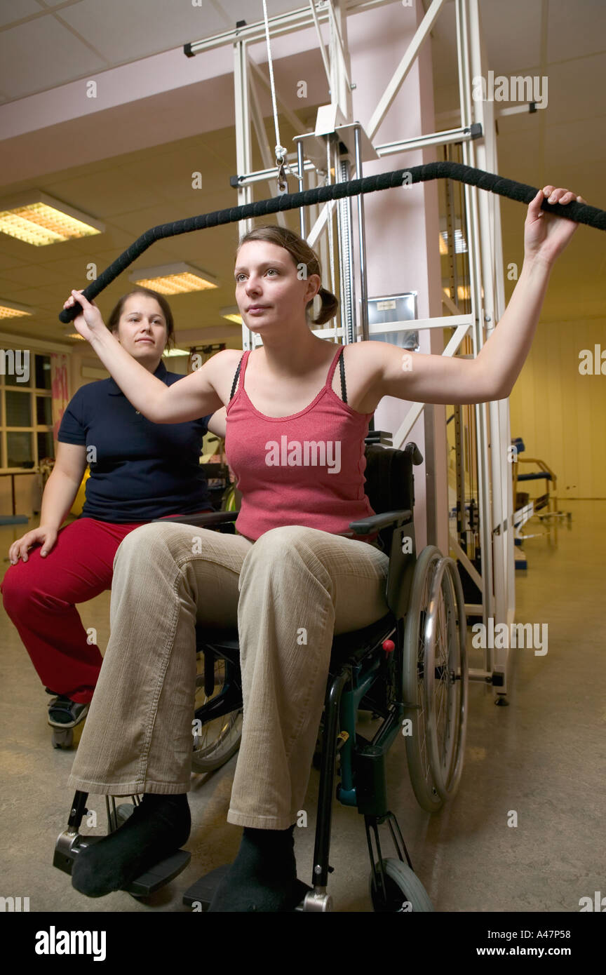 Disabled woman weight lifting Stock Photo - Alamy