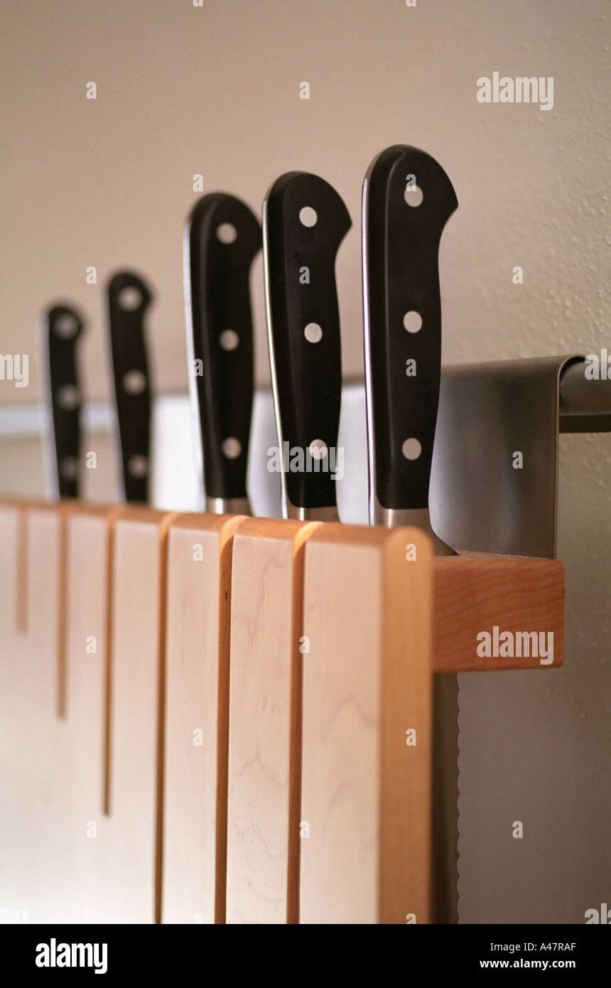 Kitchen knives in rack Stock Photo - Alamy