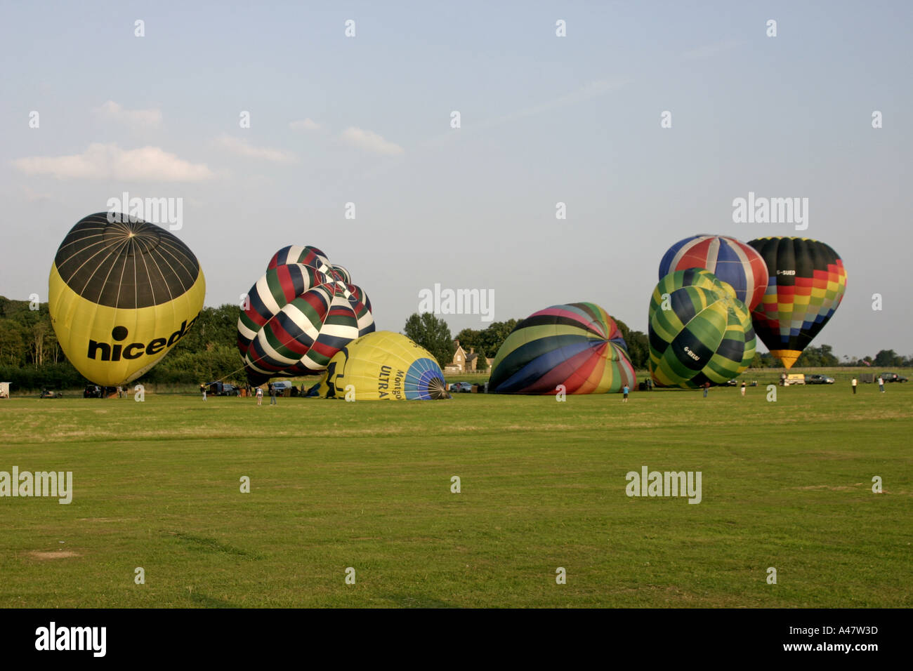 Hot air balloons inflating and taking off at Shuttleworth Air Display ...