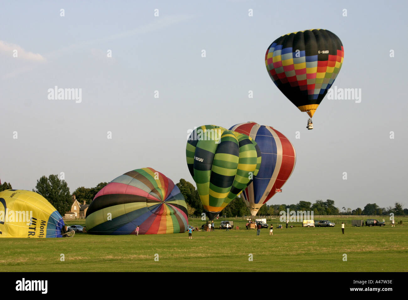 Hot air balloons inflating and taking off at Shuttleworth Air Display ...