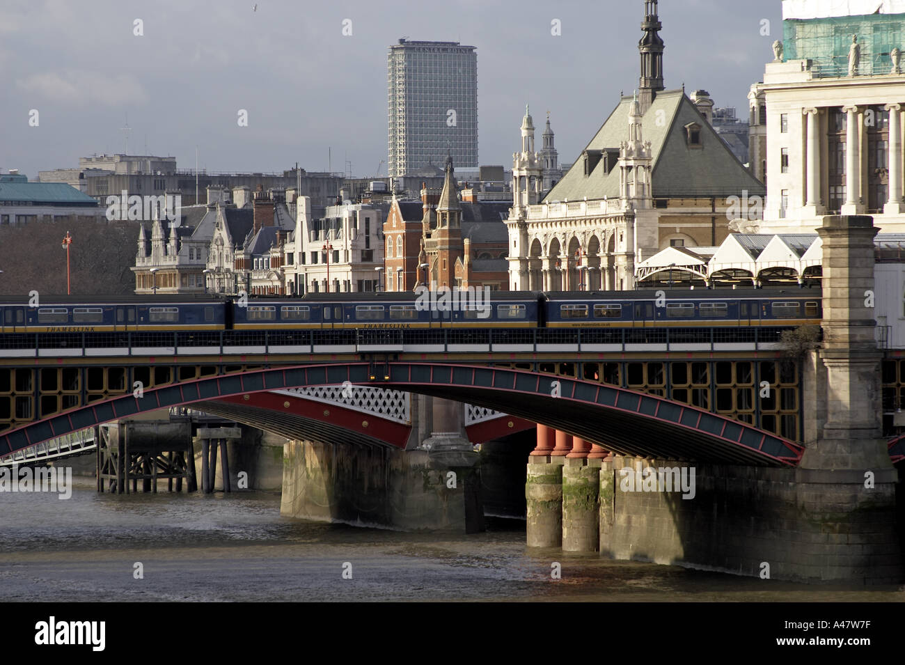 Blackfriars Bridge and London buildings with Centre Point by River ...