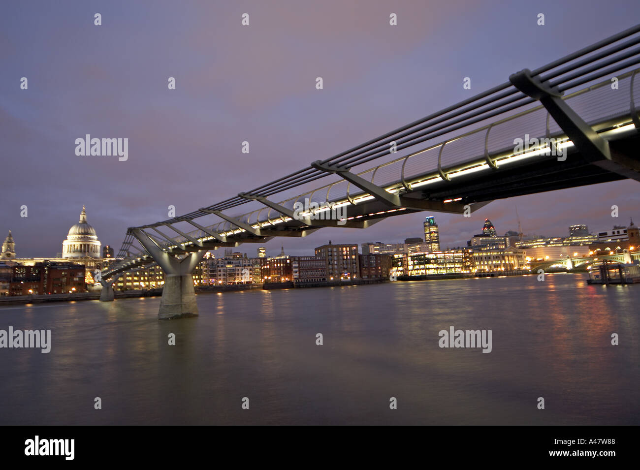 Millennium Bridge River Thames and London skyline at dusk EC4 and EC3 ...