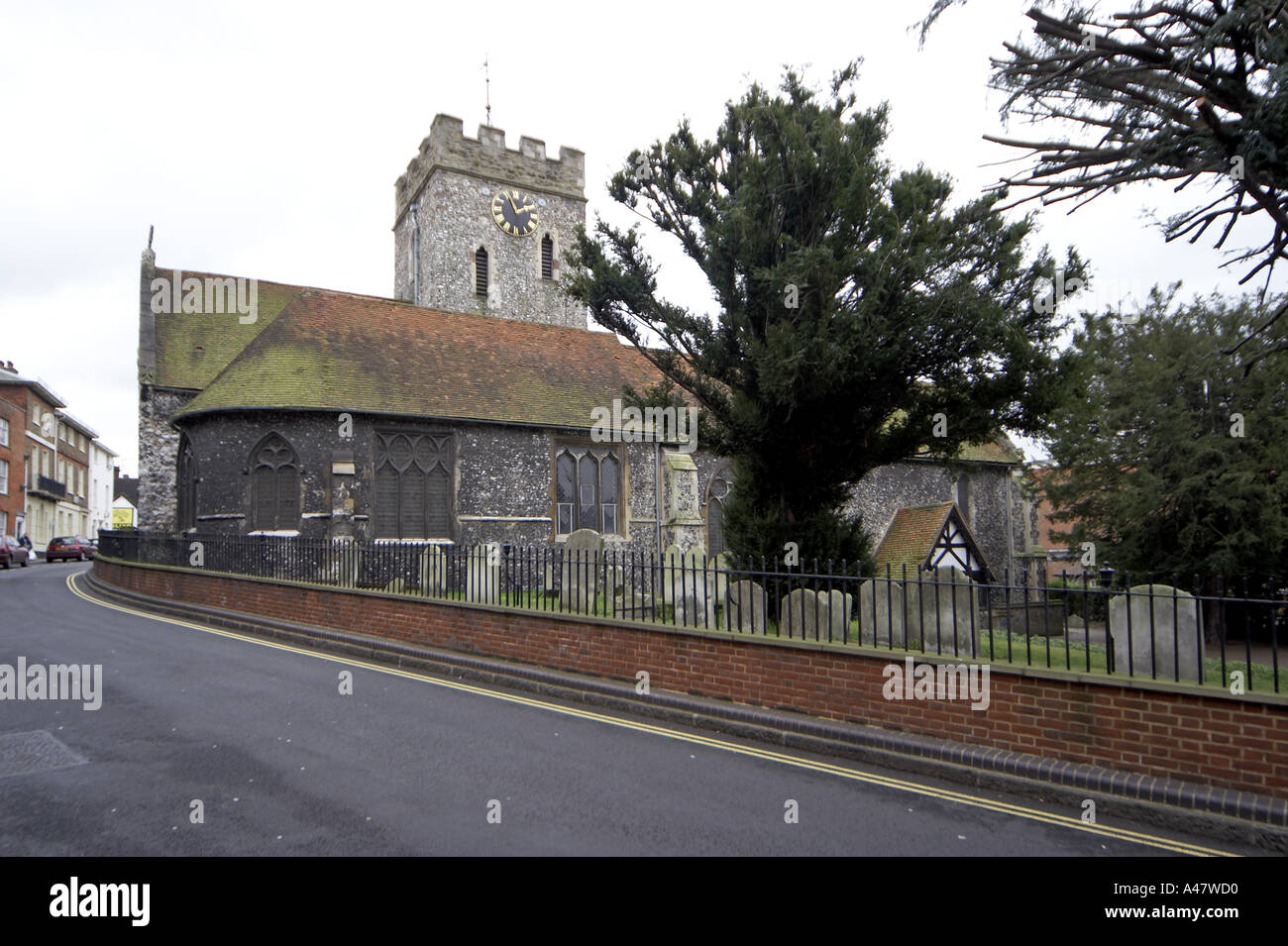 Street scene with old church in historic scenic market town of ...