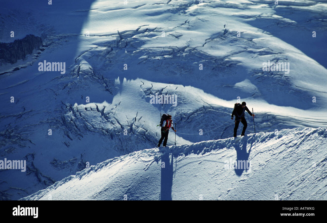 Two climbers on a ridge high in the French Alps Stock Photo - Alamy