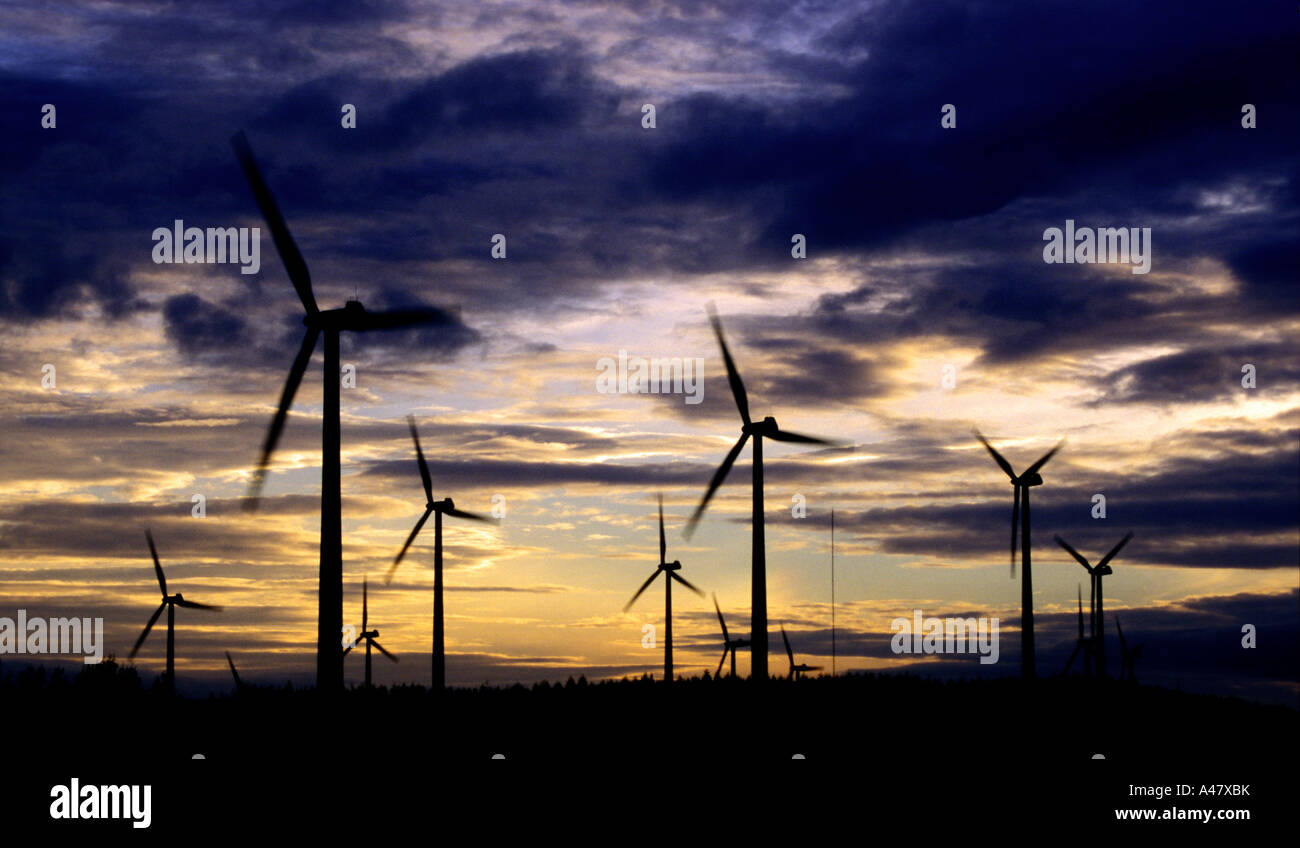 Wind turbine silhouetted against the sunset at Cap Chat in Quebec Stock ...
