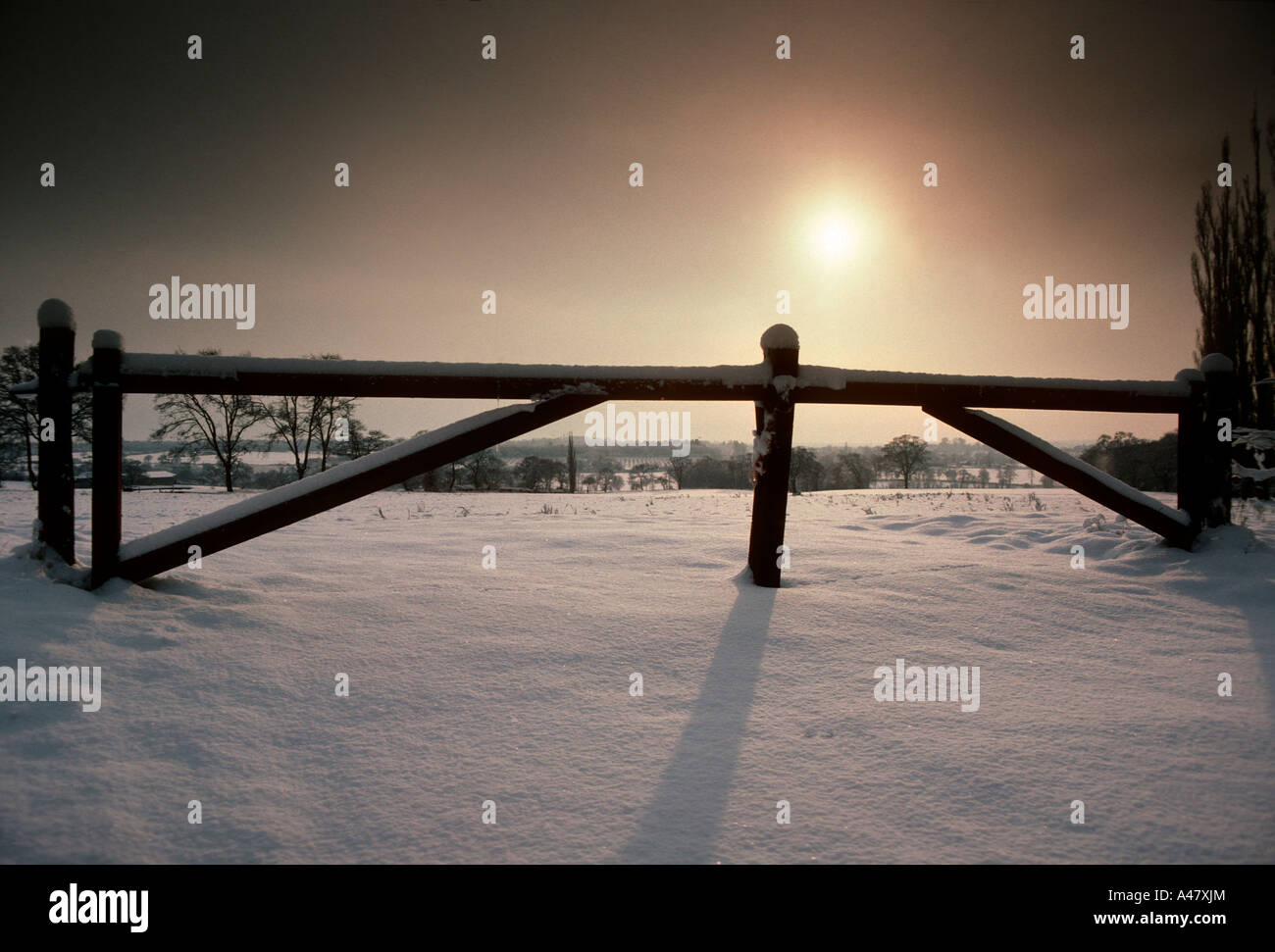 A gate to a field after heavy snow Stock Photo - Alamy