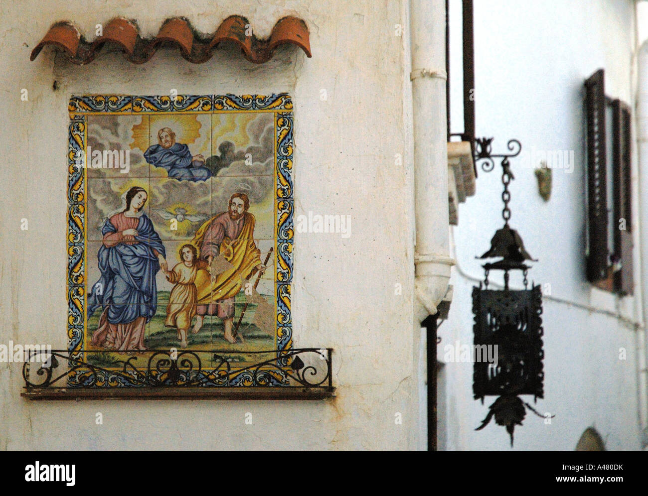 View of typical religious tile painting sacred family Sitges Catalonia ...