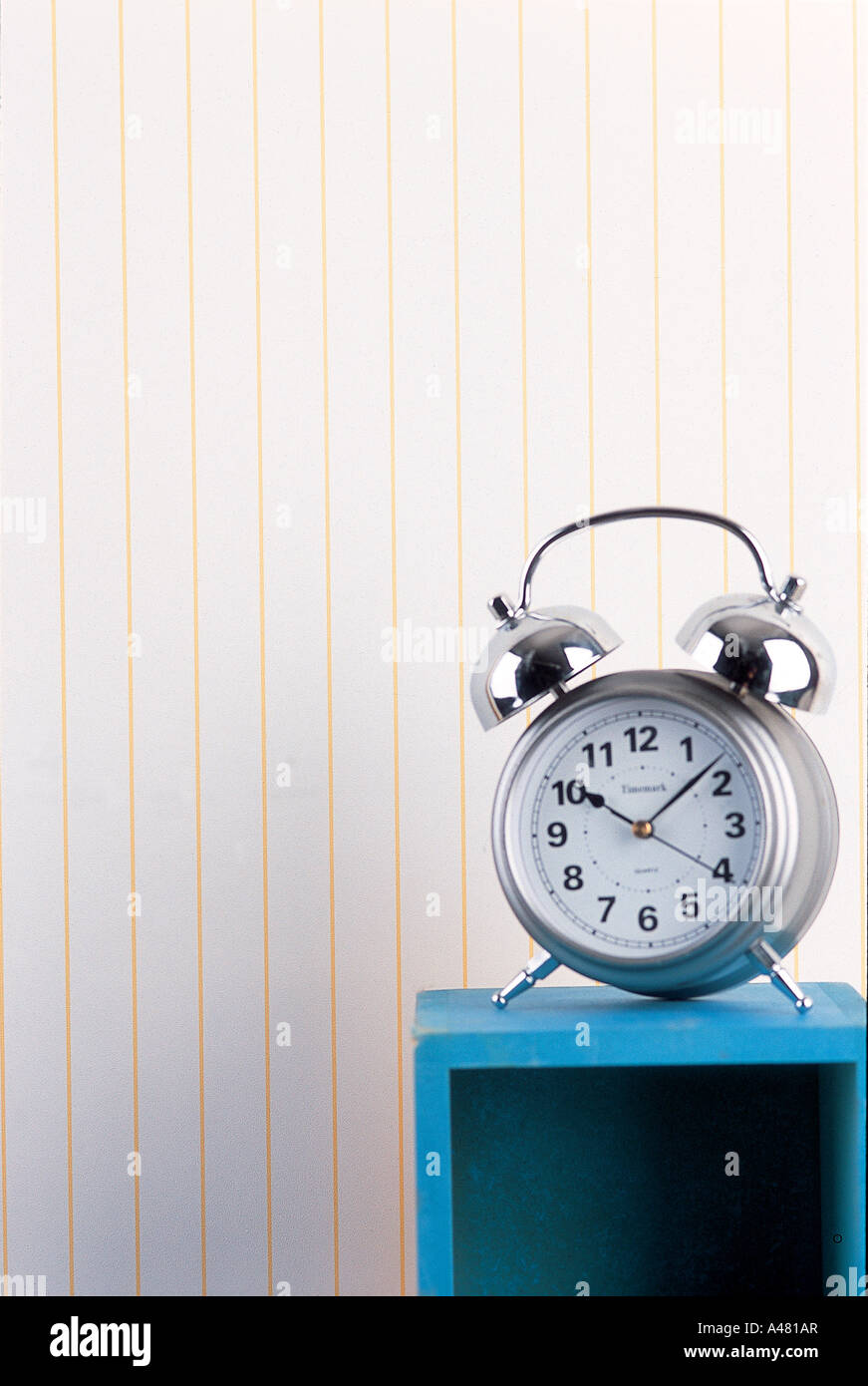 Alarm clock on a wooden structure Stock Photo - Alamy