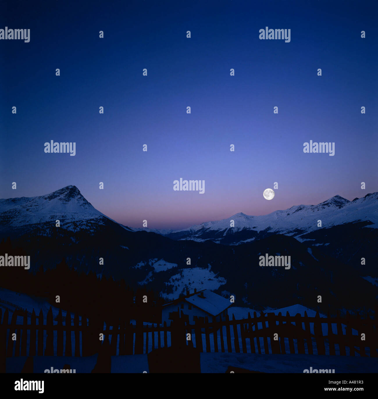 Alps peaks and full moon Stock Photo - Alamy