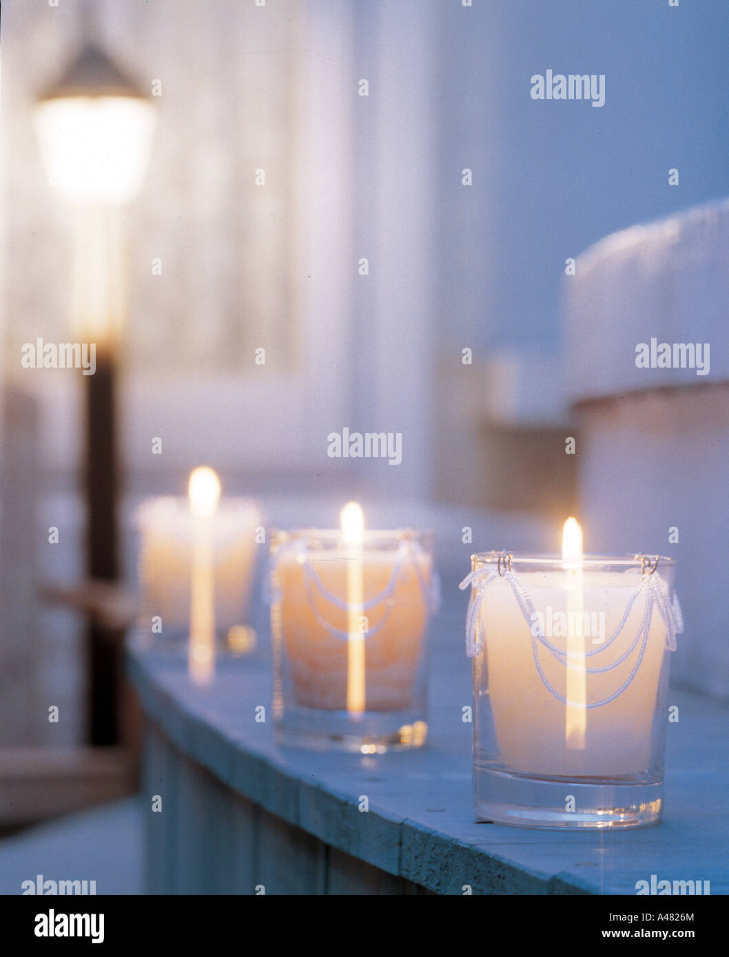 Close-up of lit candles Stock Photo - Alamy