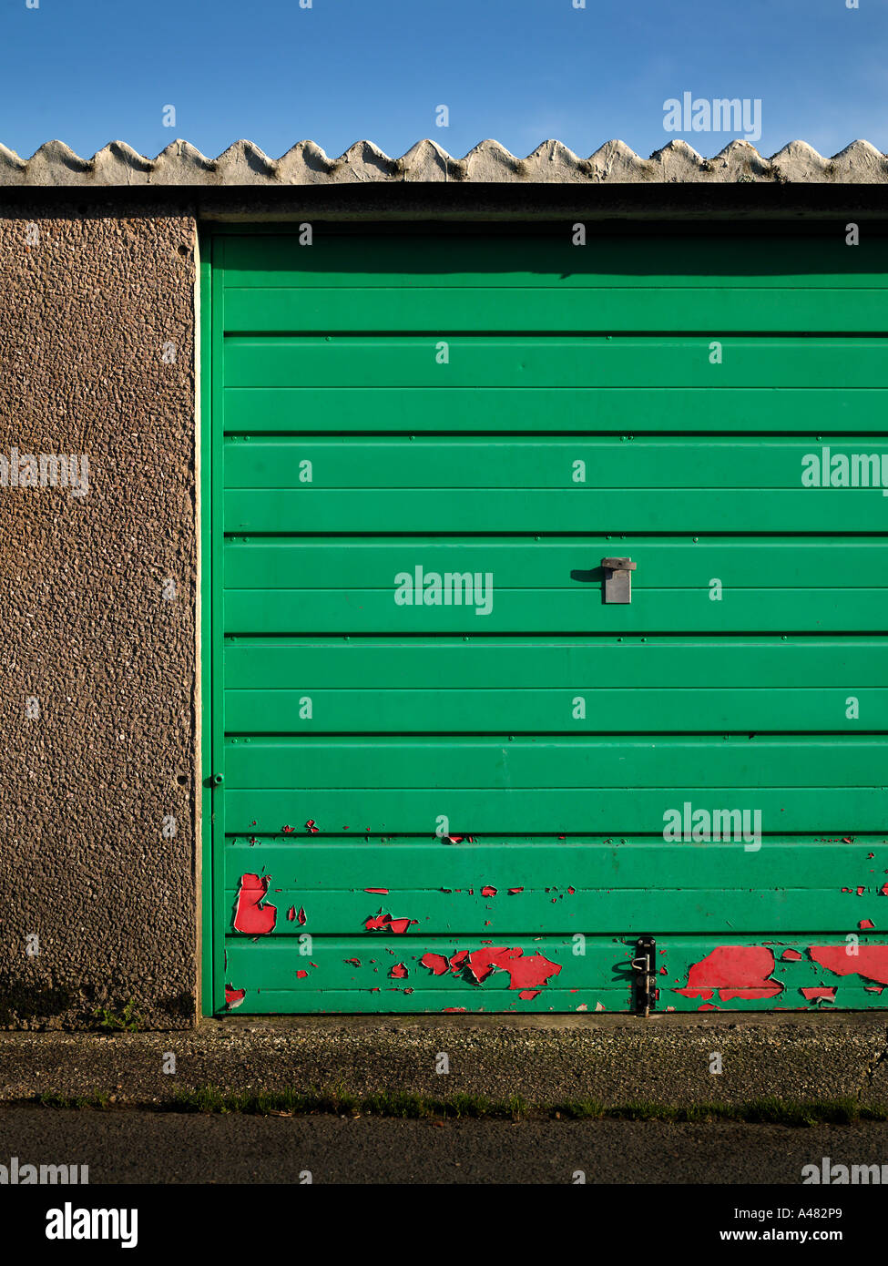 Green garage door Stock Photo - Alamy