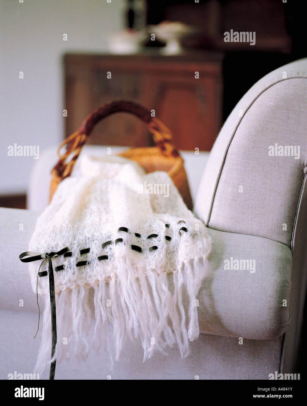 Close-up of a scarf on a couch Stock Photo - Alamy