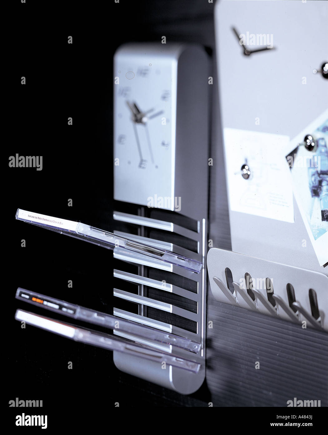 Close-up of three CD's in a CD rack Stock Photo - Alamy