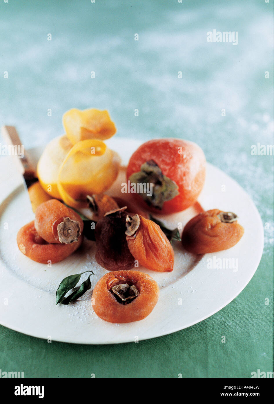 High angle view of dry and fresh persimmon Stock Photo - Alamy