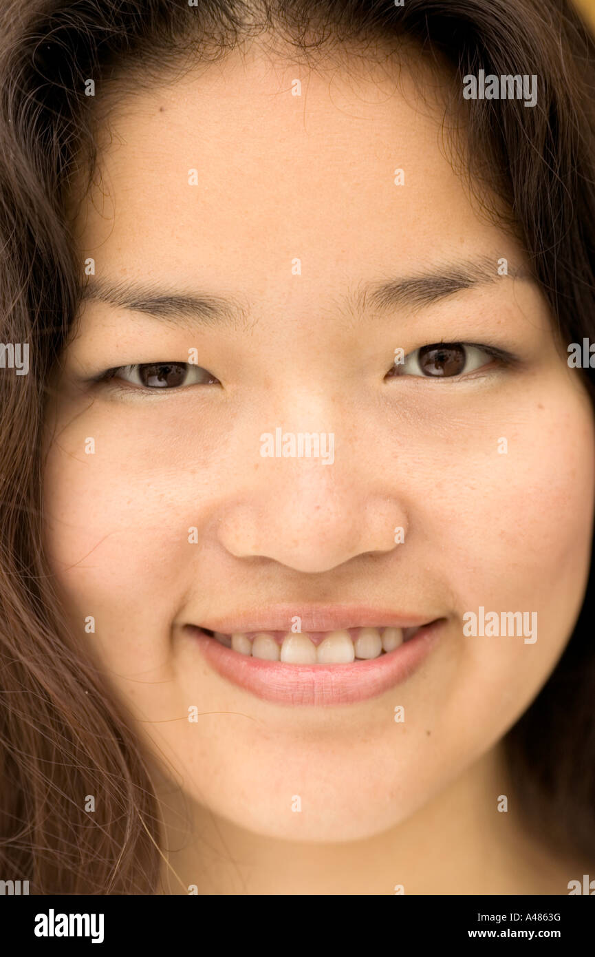 Young woman smiling, portrait Stock Photo - Alamy