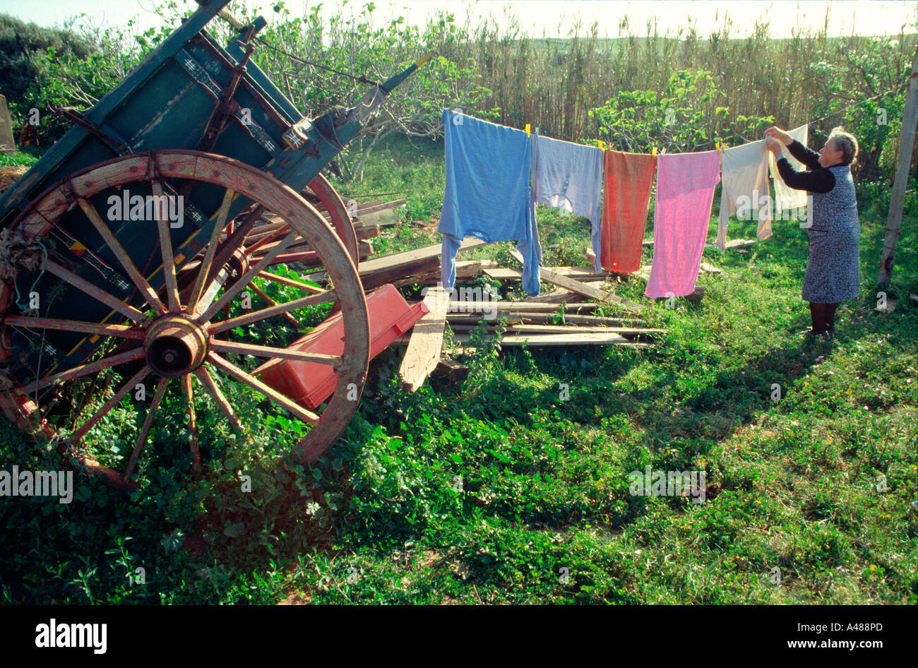 Women clothesline hi-res stock photography and images - Alamy