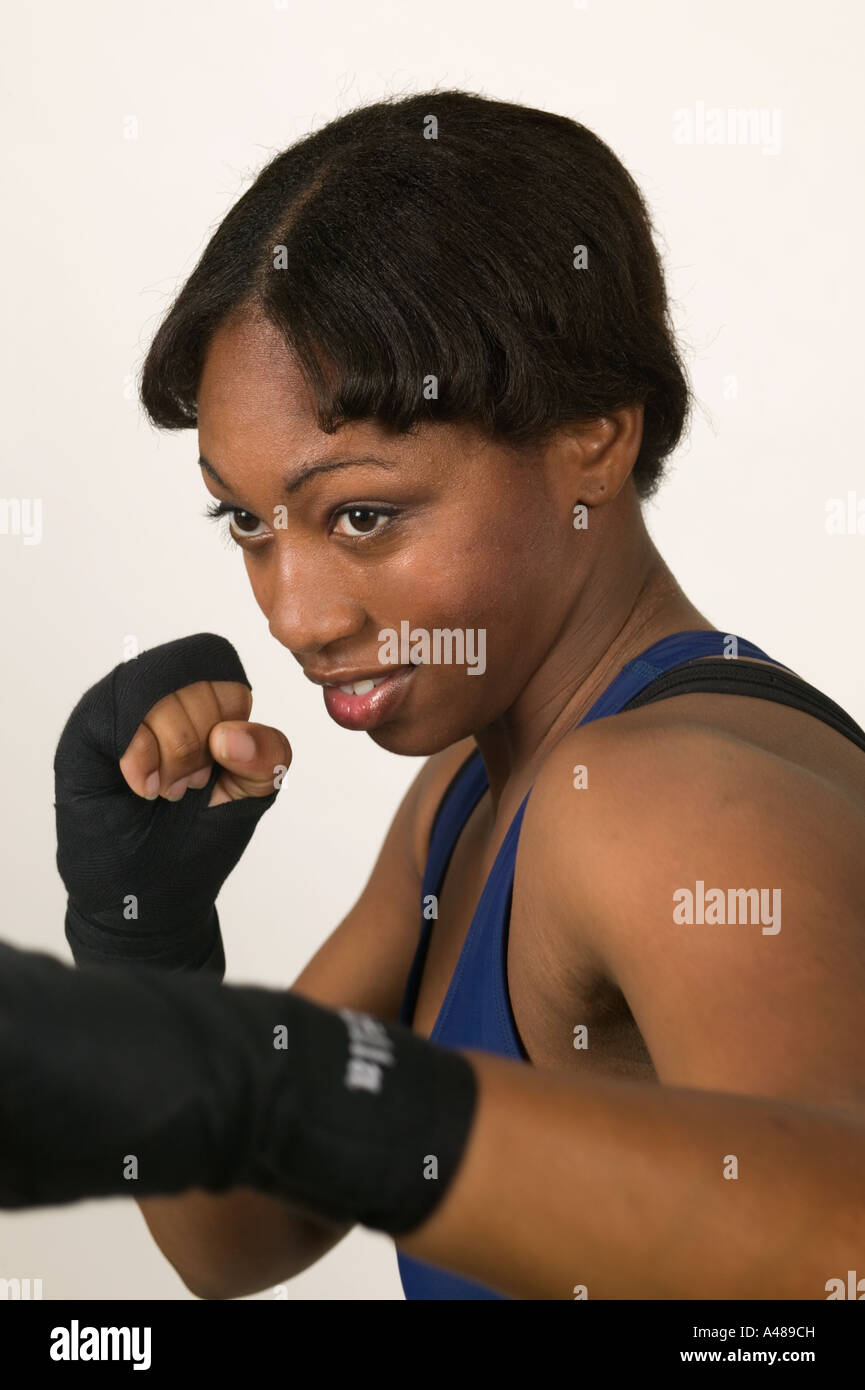 Mid adult woman practicing boxing, close up Stock Photo - Alamy