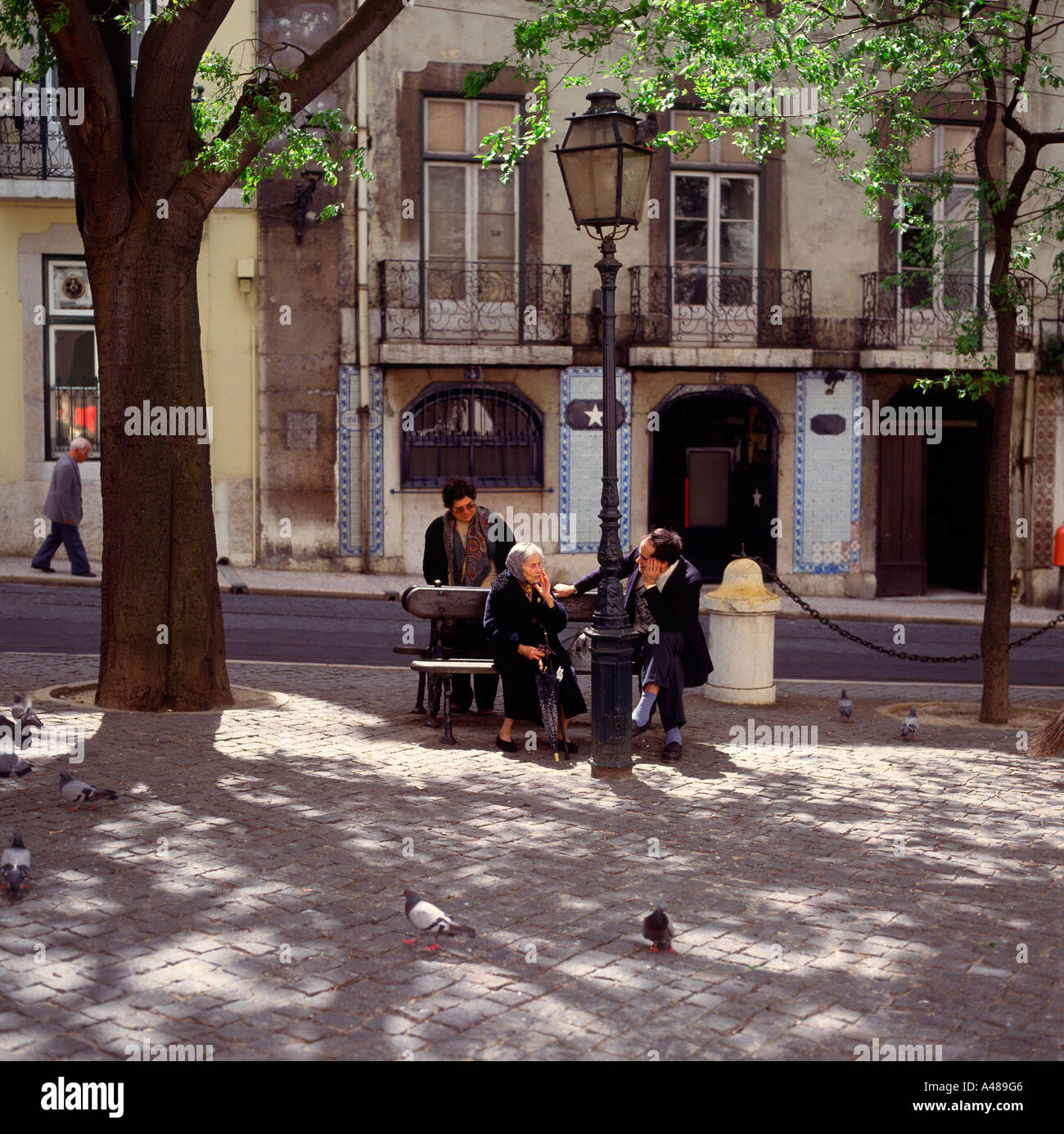 People on bench Stock Photo - Alamy