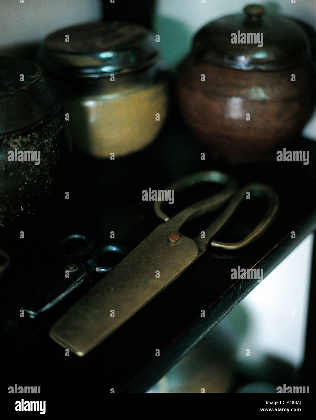 Close-up of two pairs of scissors with jars Stock Photo - Alamy