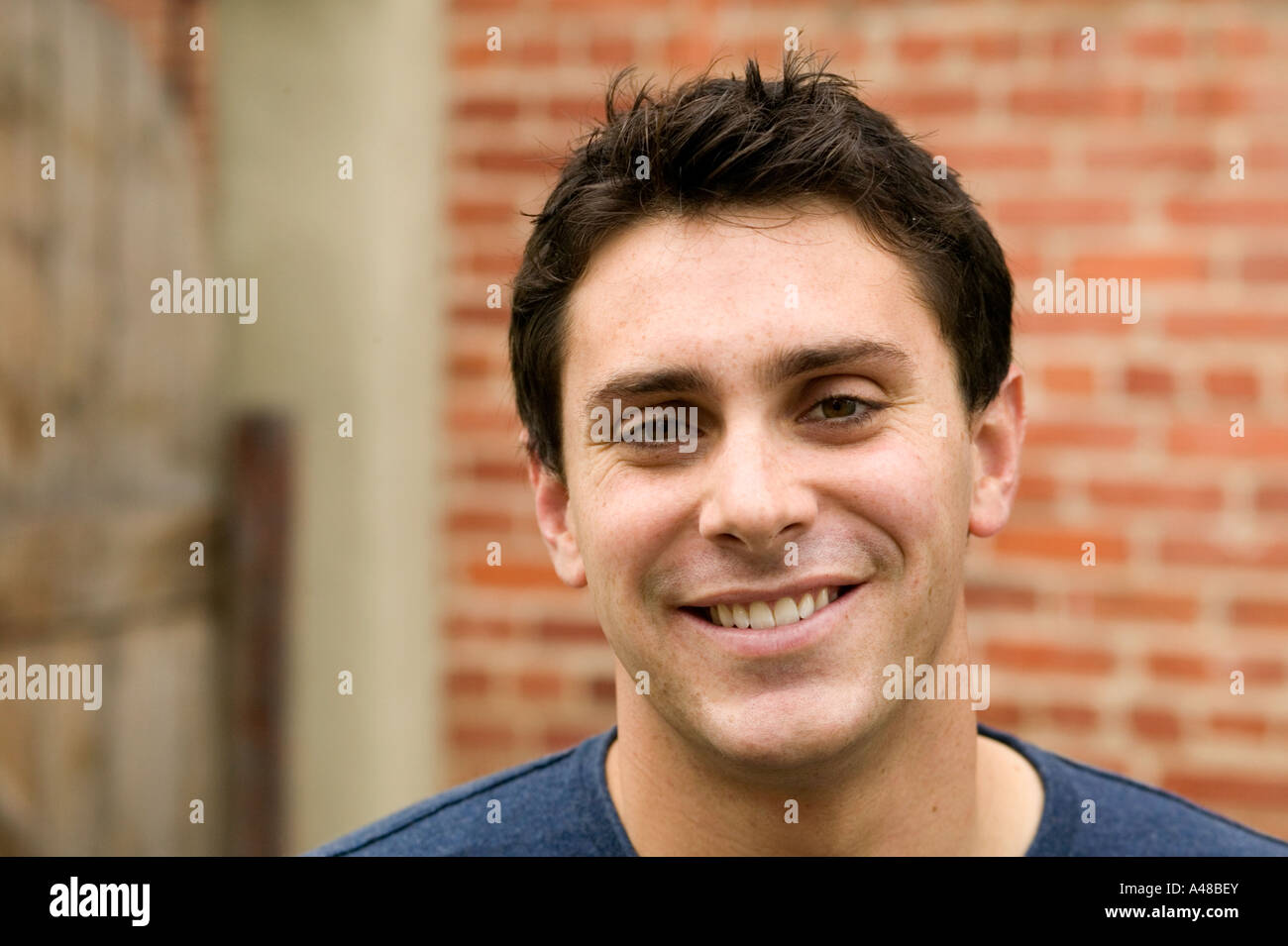 Young man smiling, portrait Stock Photo - Alamy