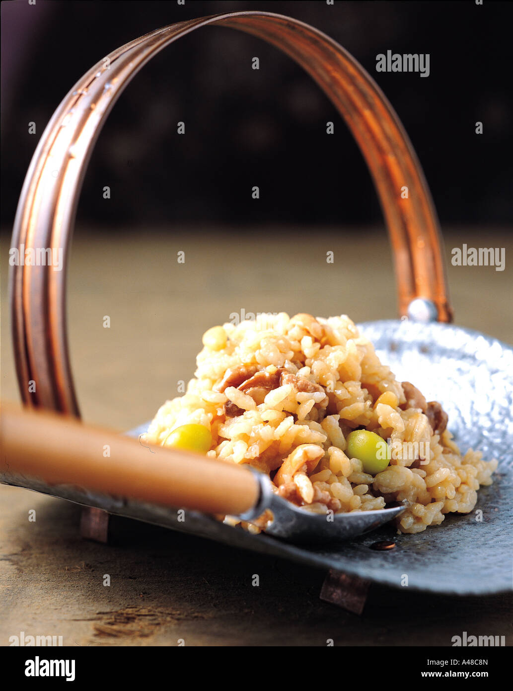 Close-up of a spoon in a platter of rice Stock Photo - Alamy