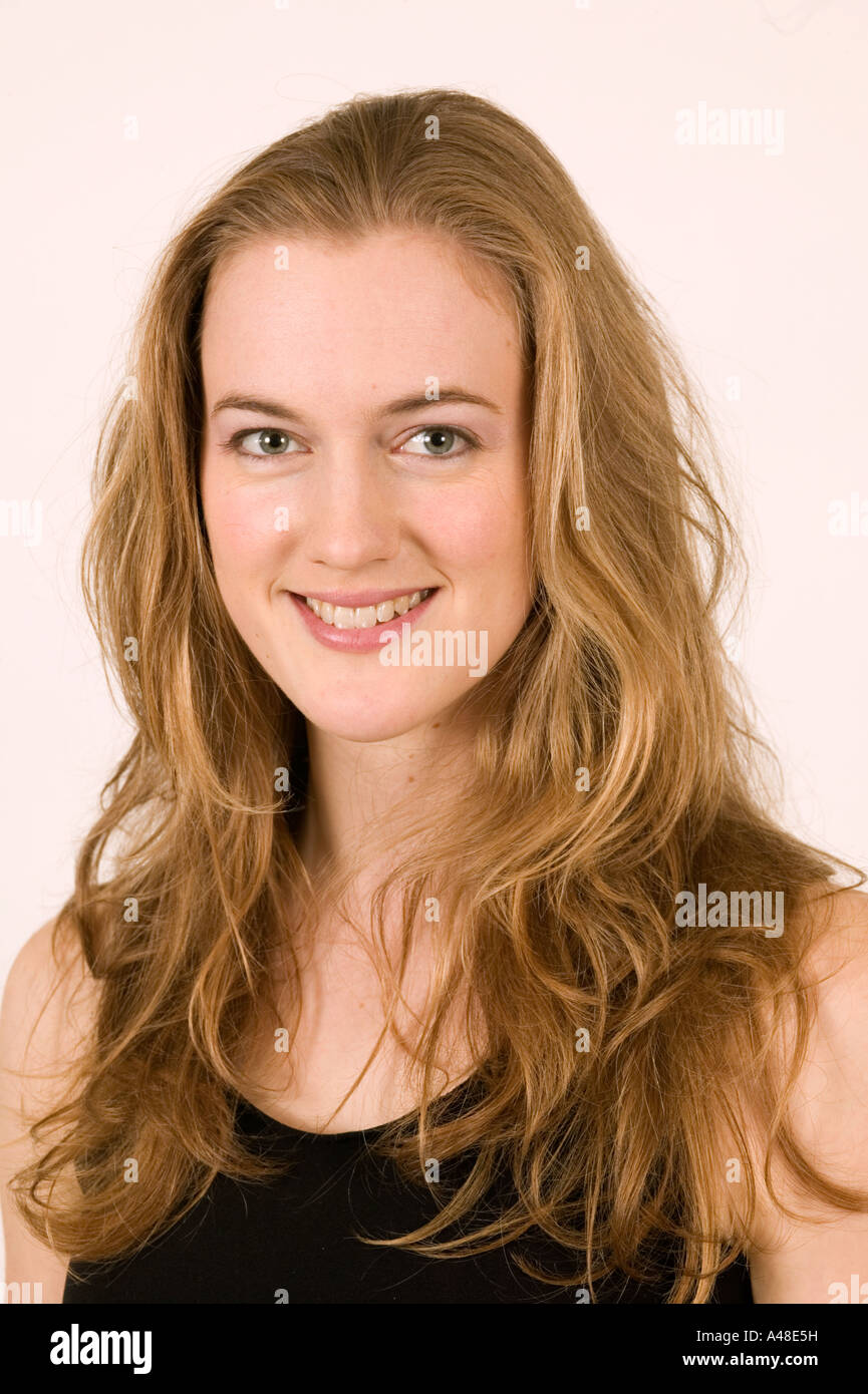 Young woman smiling, portrait Stock Photo - Alamy